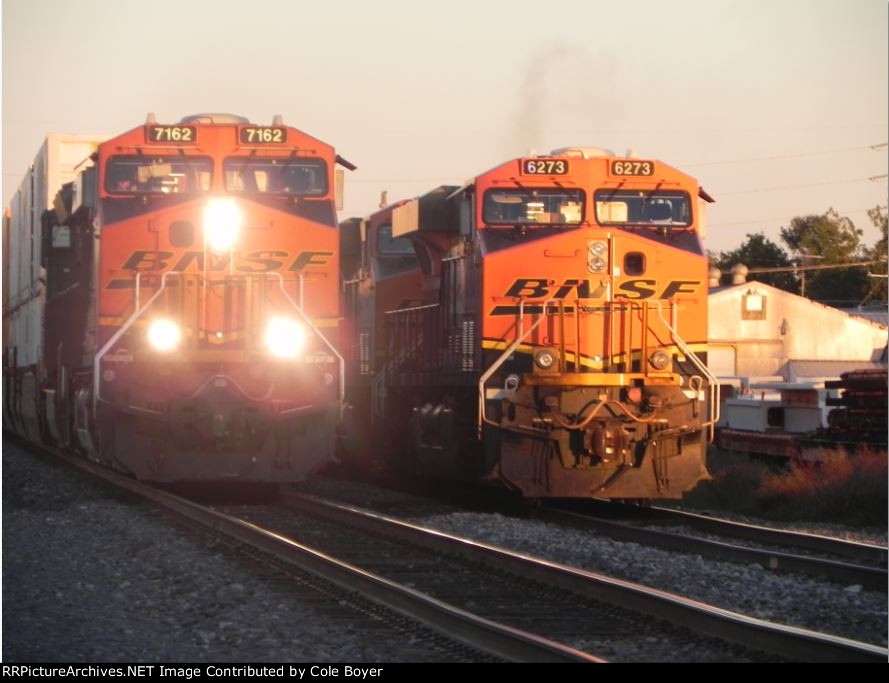BNSF 7162 passes BNSF 6243